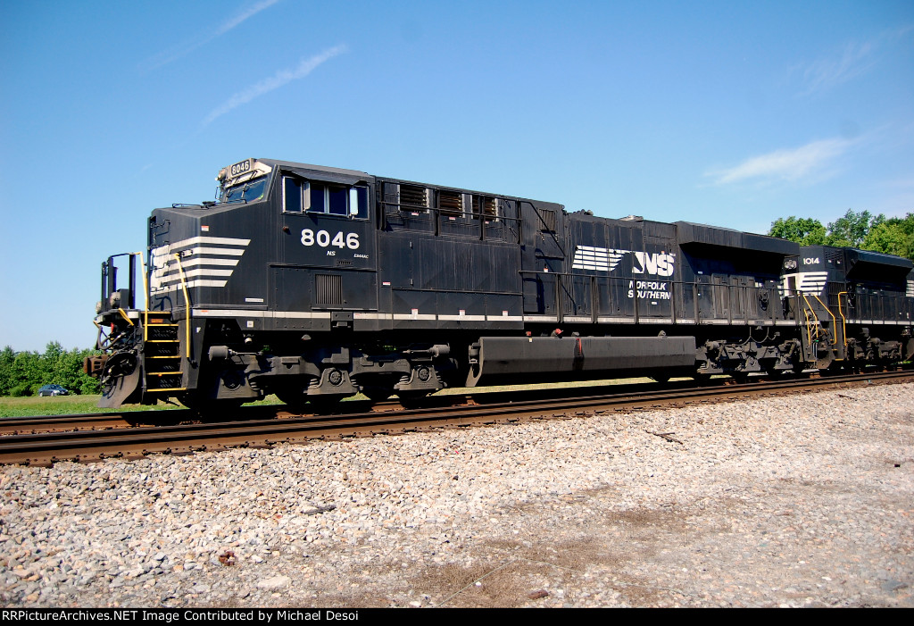 NS ES-44AC #8046 has just crossed Walters Hwy. with an eastbound